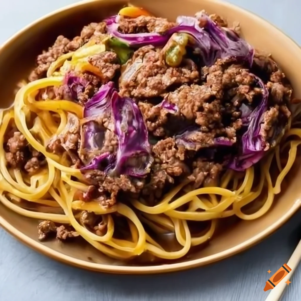 A well plated dish that incorporates ground beef on angel hair pasta ...