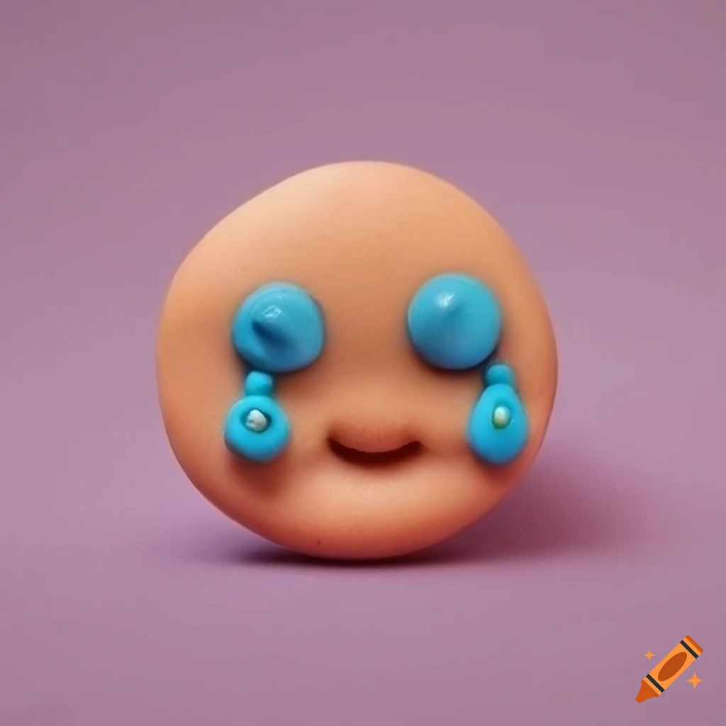 Polymer clay sculpture of a cute crying face