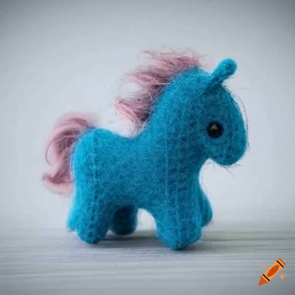 Fluffy felt toy pony with its babies