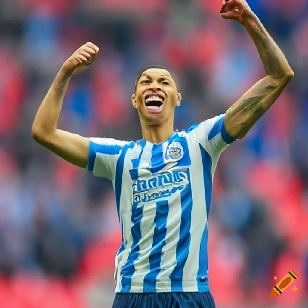 Ryan Mmaee lifting the FA Cup after scoring the final goal at Wembley ...
