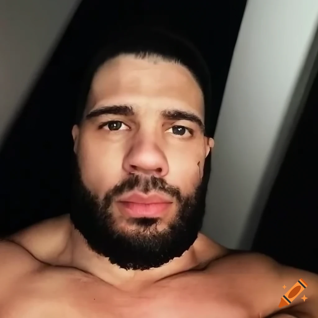 Muscular man with a serious face in the wilderness under the afternoon ...