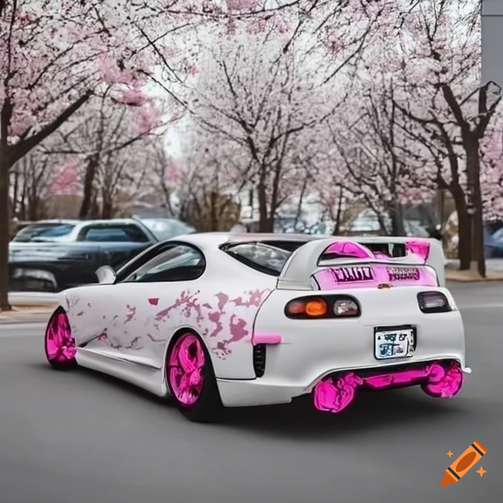 Cherry blossom car wrap on a white toyota supra mk4 with pink wheel on ...