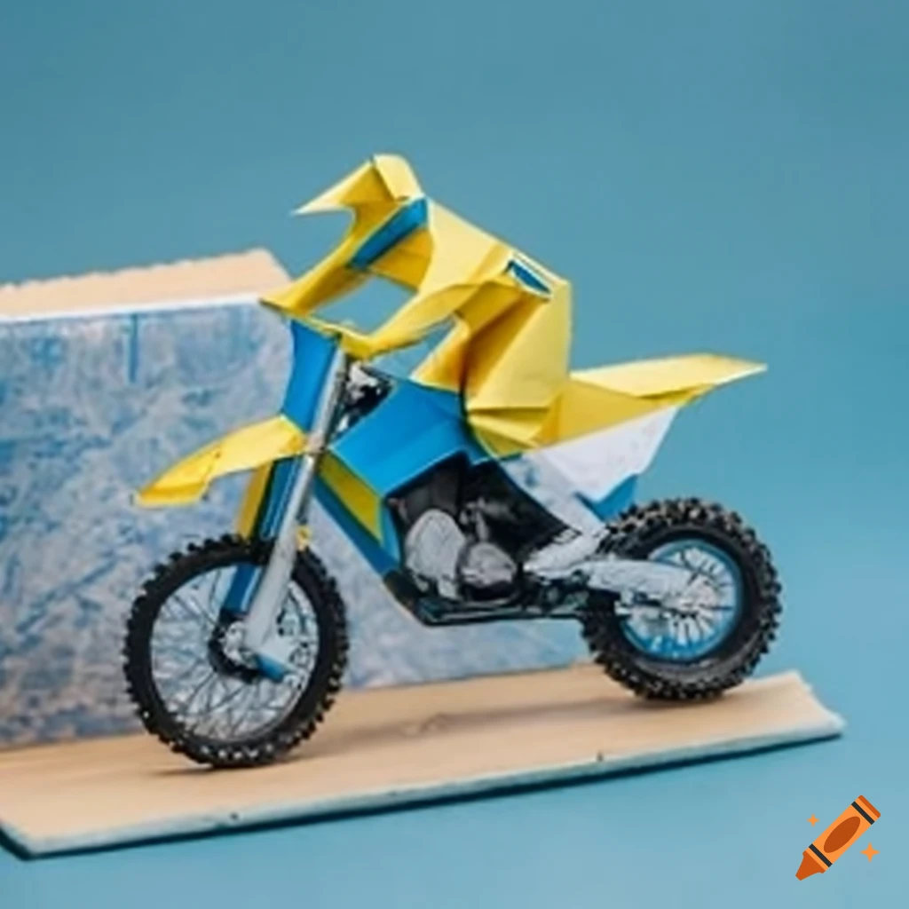 Origami diorama depicting motocross with miniature papercraft mockup on ...