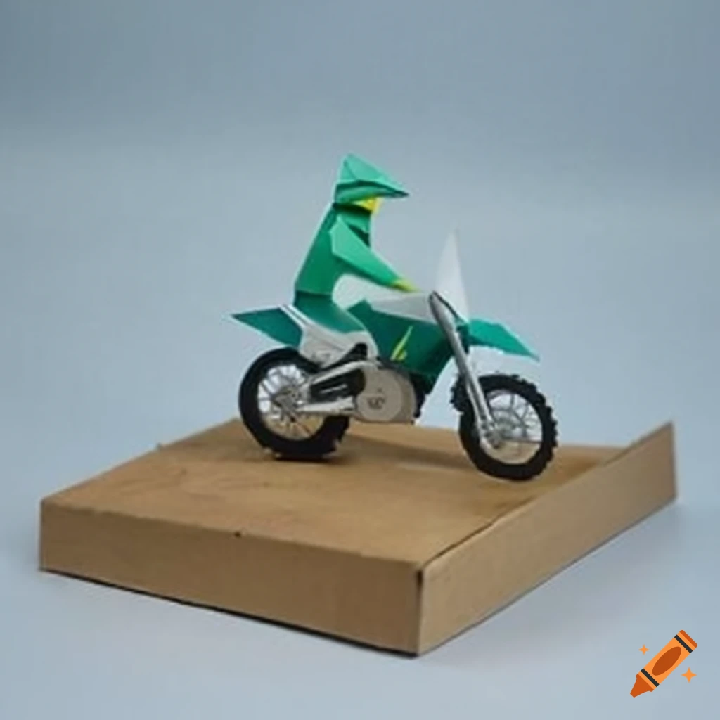 Origami diorama depicting motocross with miniature papercraft mockup on ...