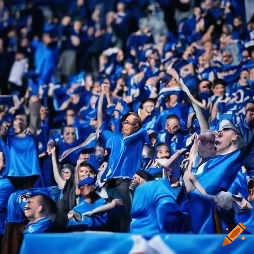 Passionate blue soccer team fans in jerseys waving flags in the stands ...