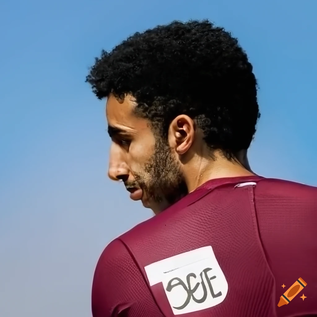 A sprinter with arabic features getting ready for the 200 meters dash ...