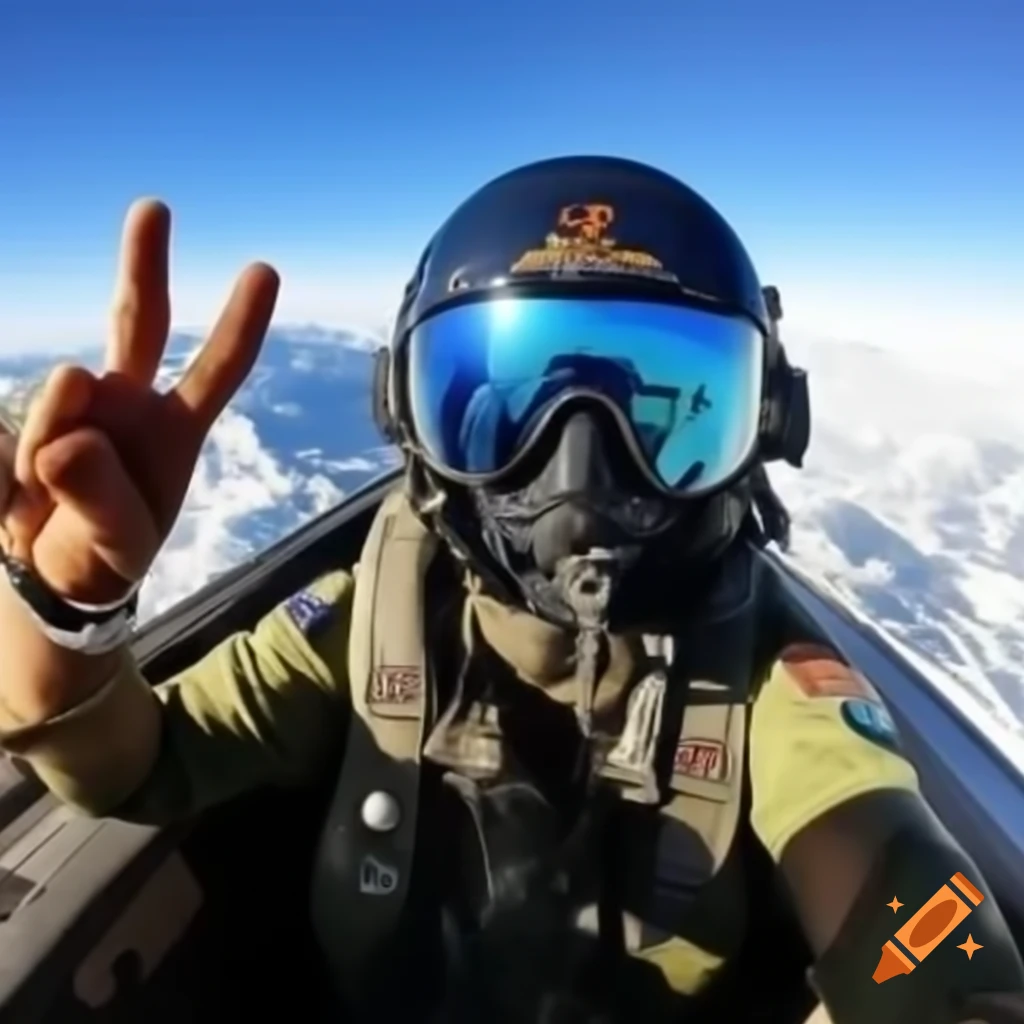 Pilot with helmet in Tejas jet making hang loose gesture over mountains ...